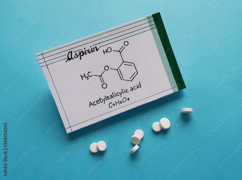 Structural chemical formula of aspirin molecule with pills and tablets ...
