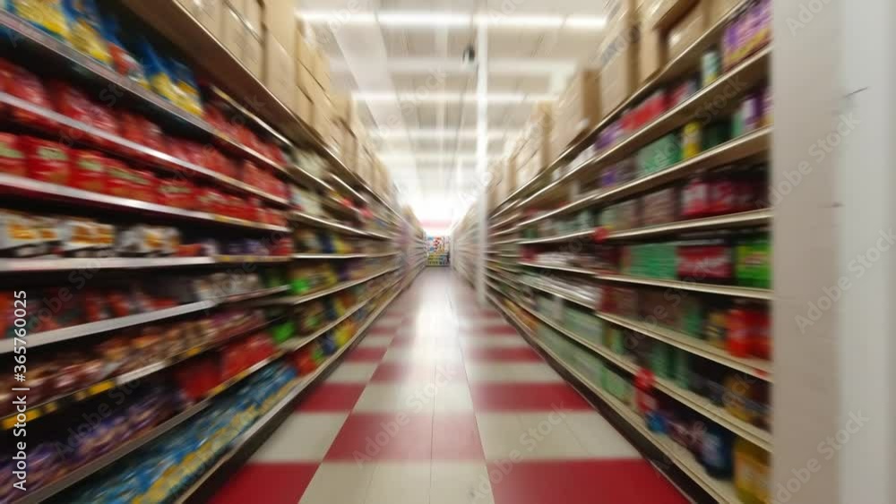 Supermarket shopping pov action camera motion in the row of the store ...