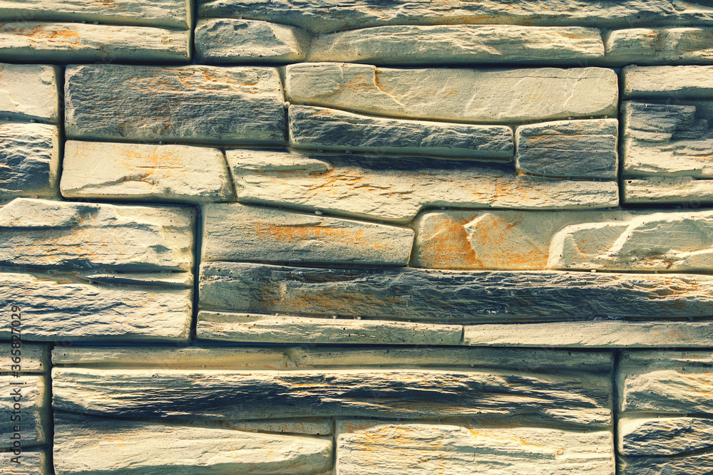 Stacked stone wall, natural stone cladding. Stone wall for background ...