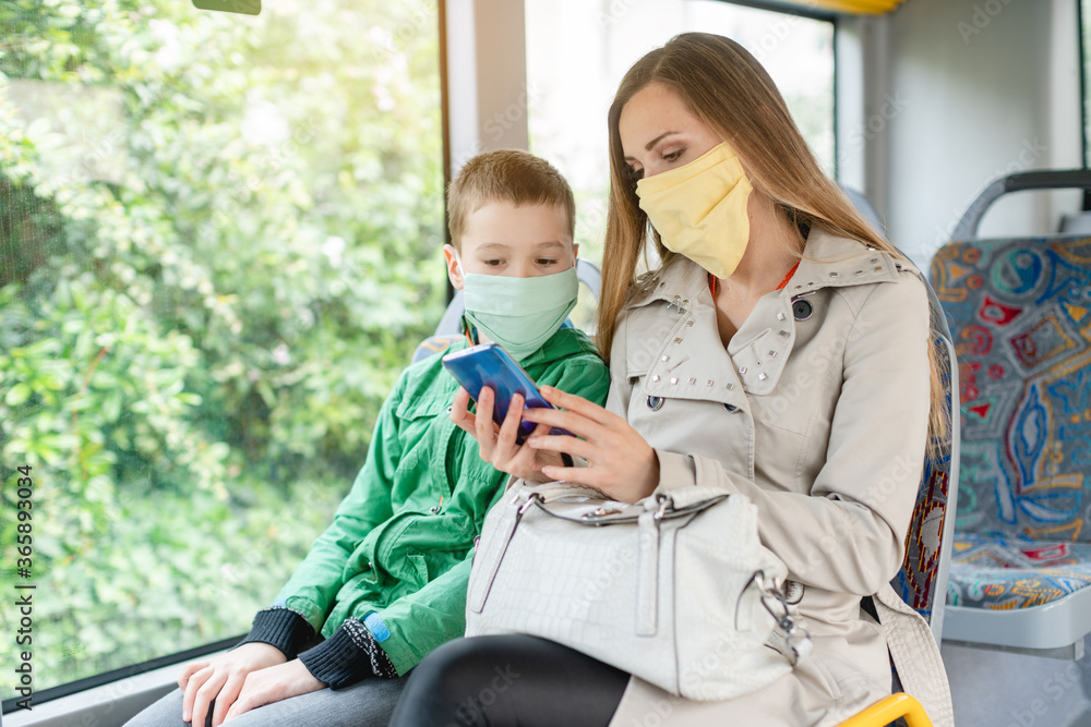 Woman with her son in the bus during coronavirus crisis Photos | Adobe ...