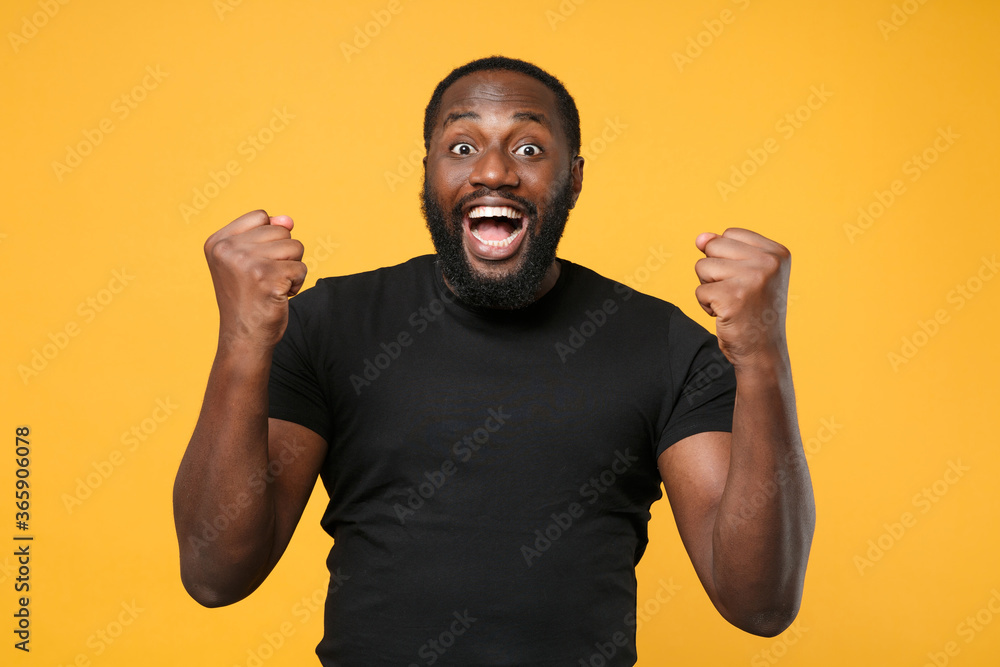 Happy african american man guy football fan in casual black t-shirt ...