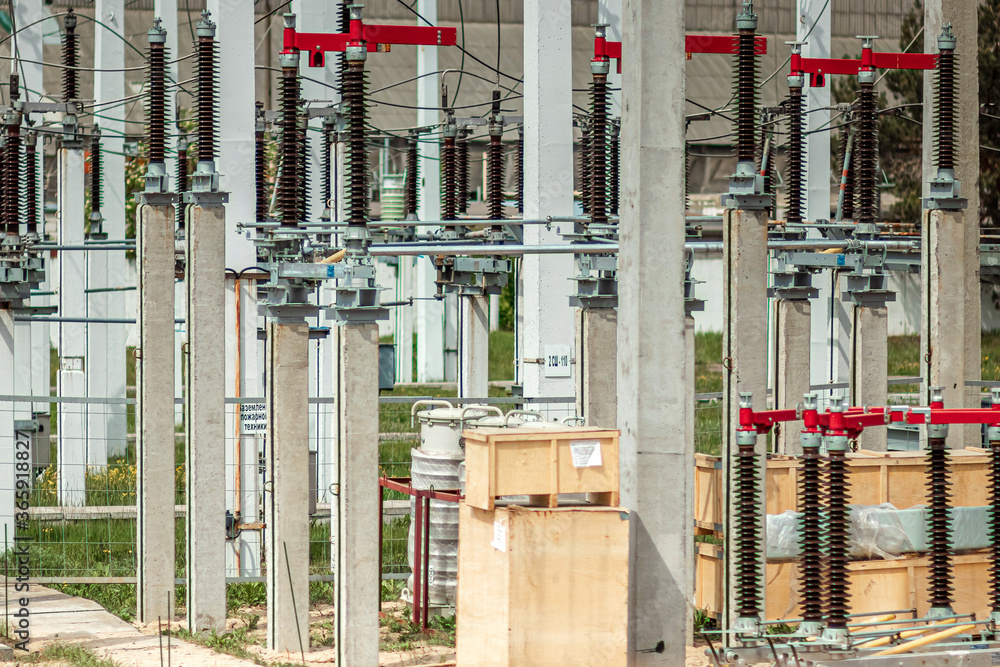 High-voltage transformer substation. High voltage power lines. Stock ...