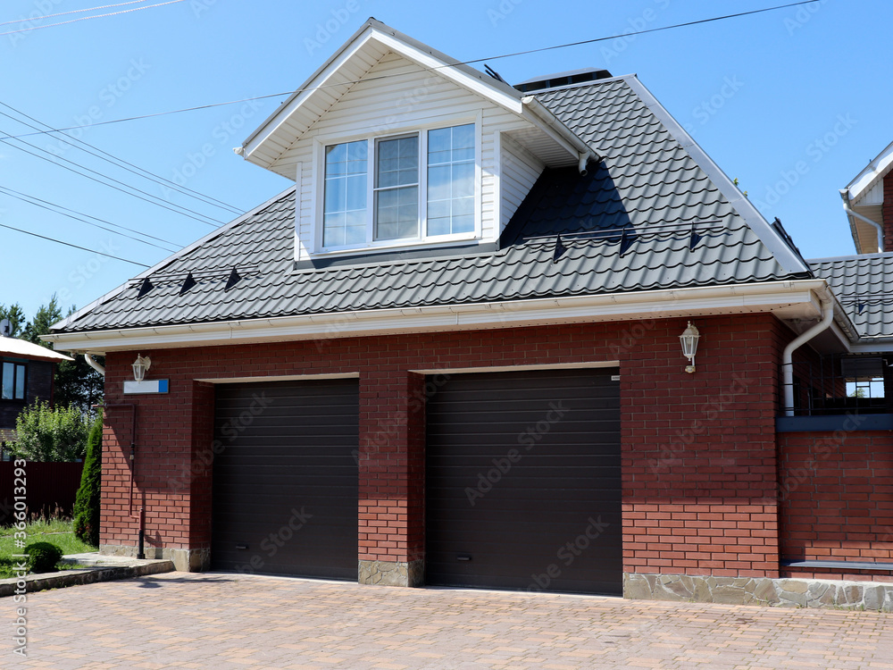 Modern European-style garage with automatic doors. Car Parking in the ...