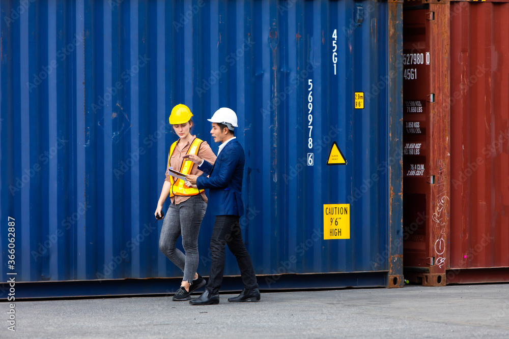 Man manager and woman Supervisor dock cargo checking and control ...