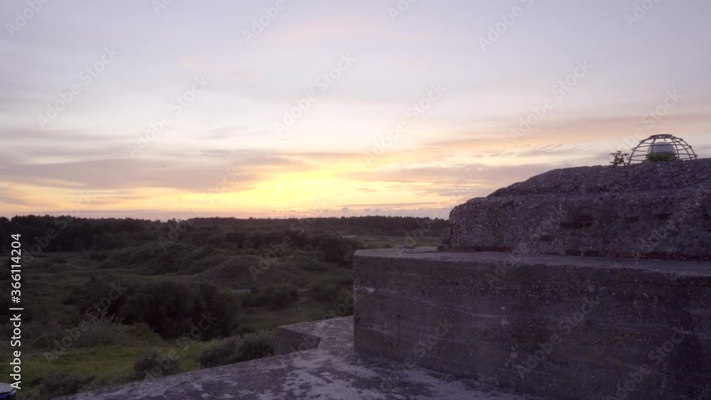 Upward moving wide shot of a German (Nazi) bunker called Wassermann ...