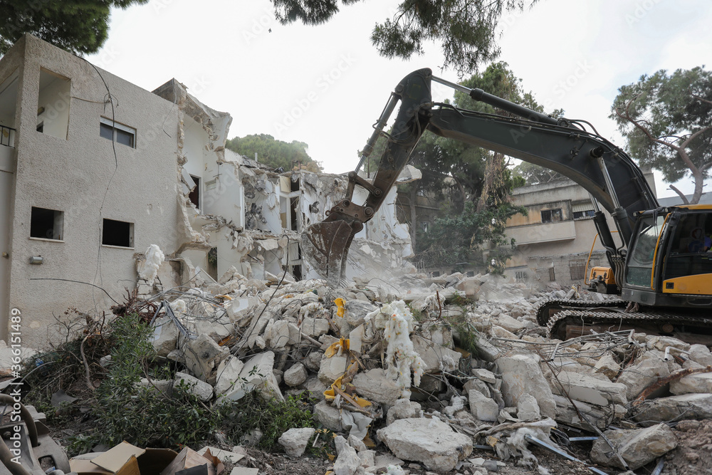 Urban Regeneration. Demolition of a building for new construction ...