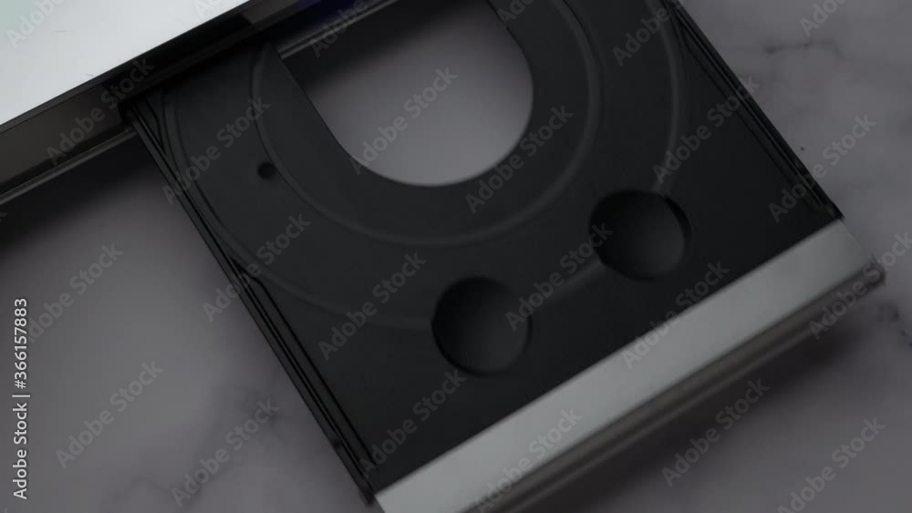 Top View DVD Disc, Eject Tray And Insert Disc In DVD-player. Man Of ...