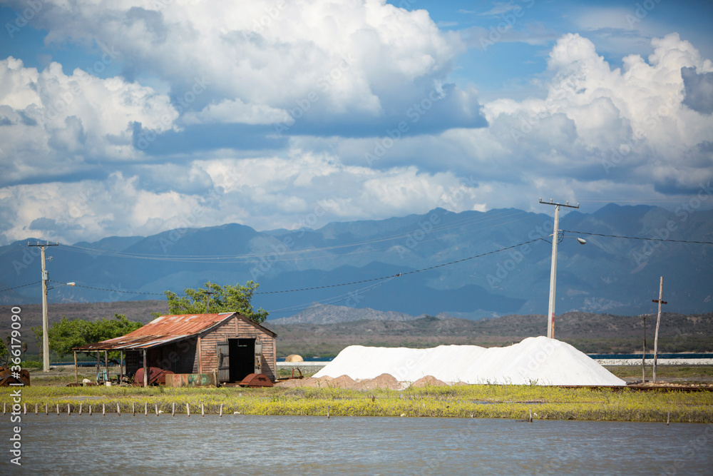 The mined mountains of salt outside. Extraction of salt by hand ...
