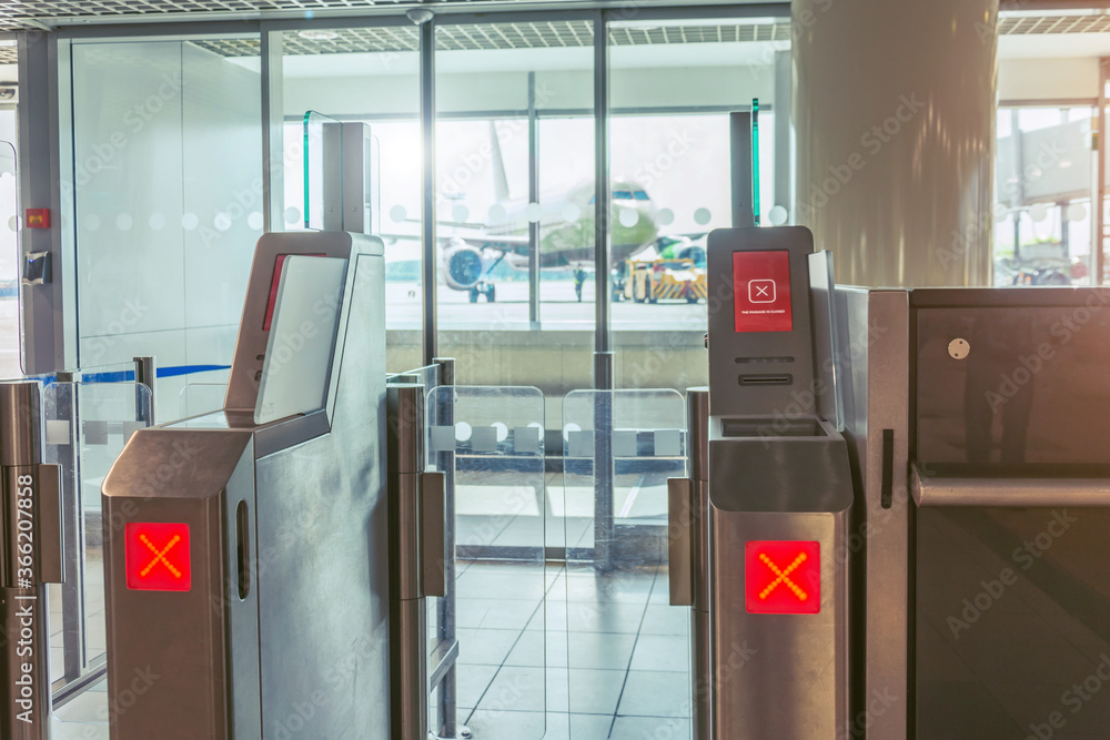Red Cross the passage is closed sign Empty gateway terminal area in ...