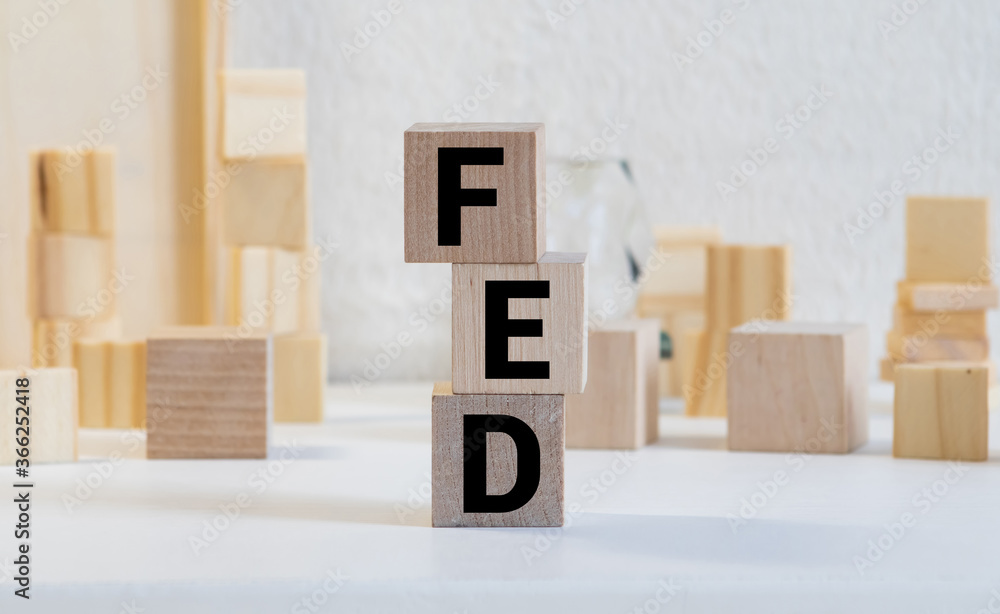 FED, Federal Reserve concept, cube wooden block with alphabet building ...