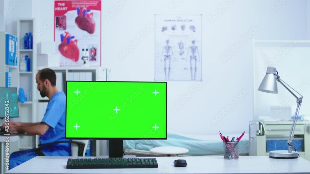 Monitor in hospital cabinet with chroma key while doctor and nurse ...