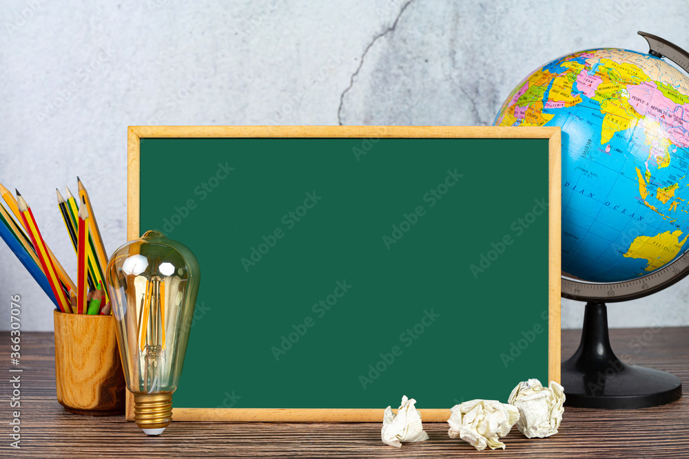 International day literacy concept with learning tools on a blue ...