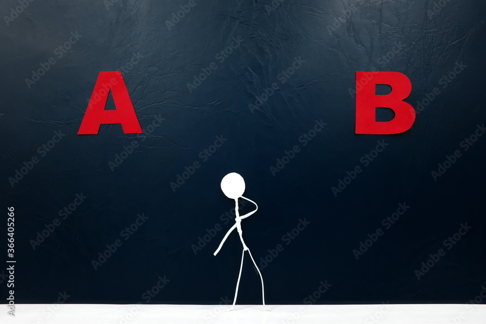 Human stick figure choosing between red A or B letter cutout. Dilemma ...