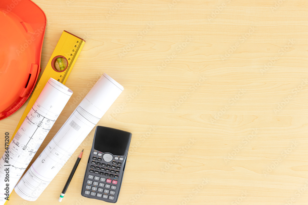 Top view engineer desk light brown wood texture have roll home plan and ...