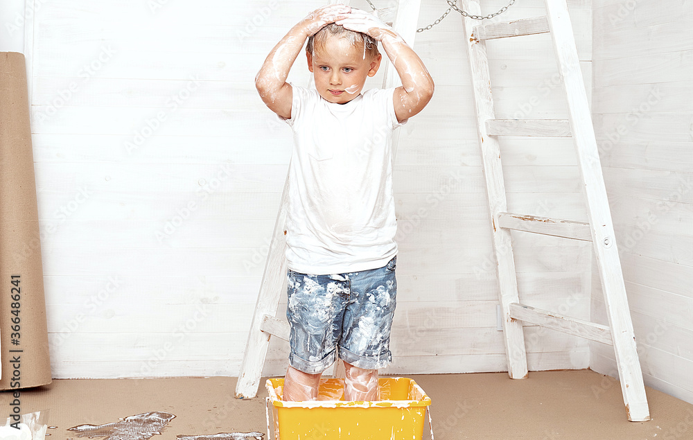 Happy kids painting wall at home. Stock Photo | Adobe Stock