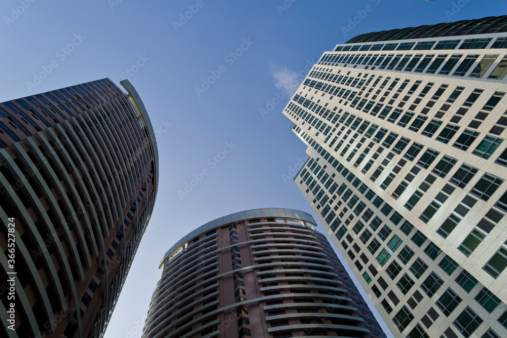 Looking up at luxury residential condominiums. Modern contemporary ...