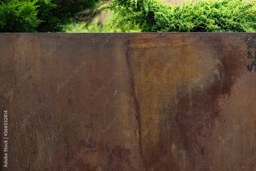 Old rusty metal surface with black paint flaking and cracking texture ...