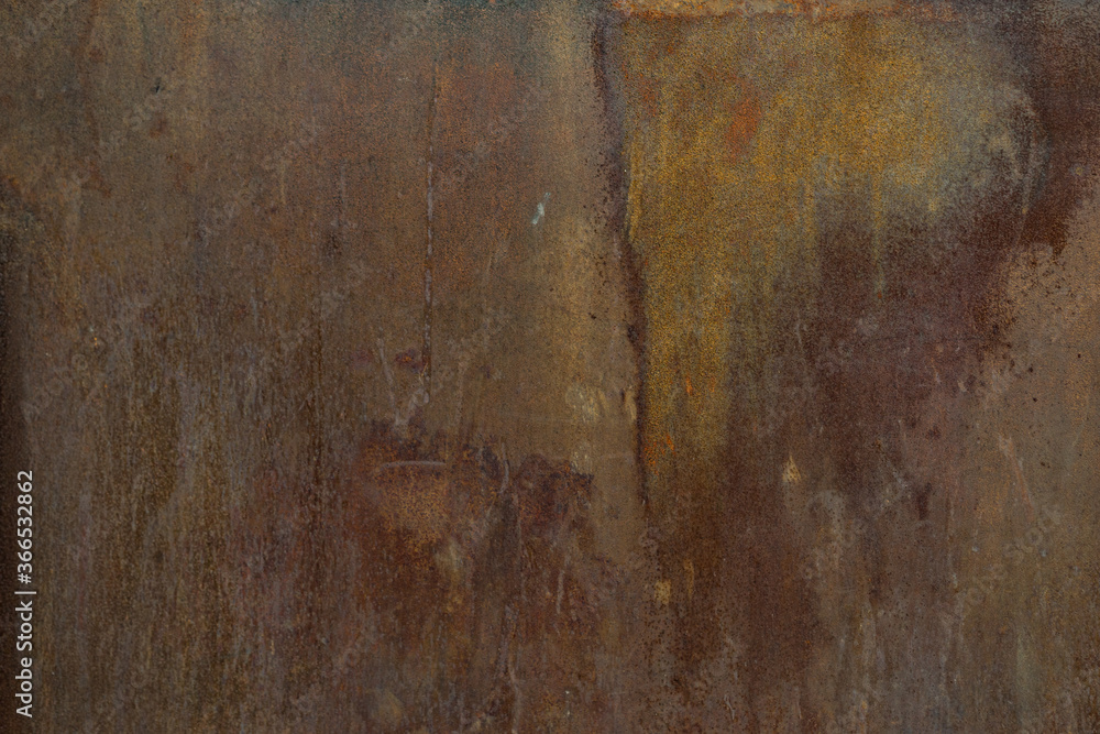 Old rusty metal surface with black paint flaking and cracking texture ...