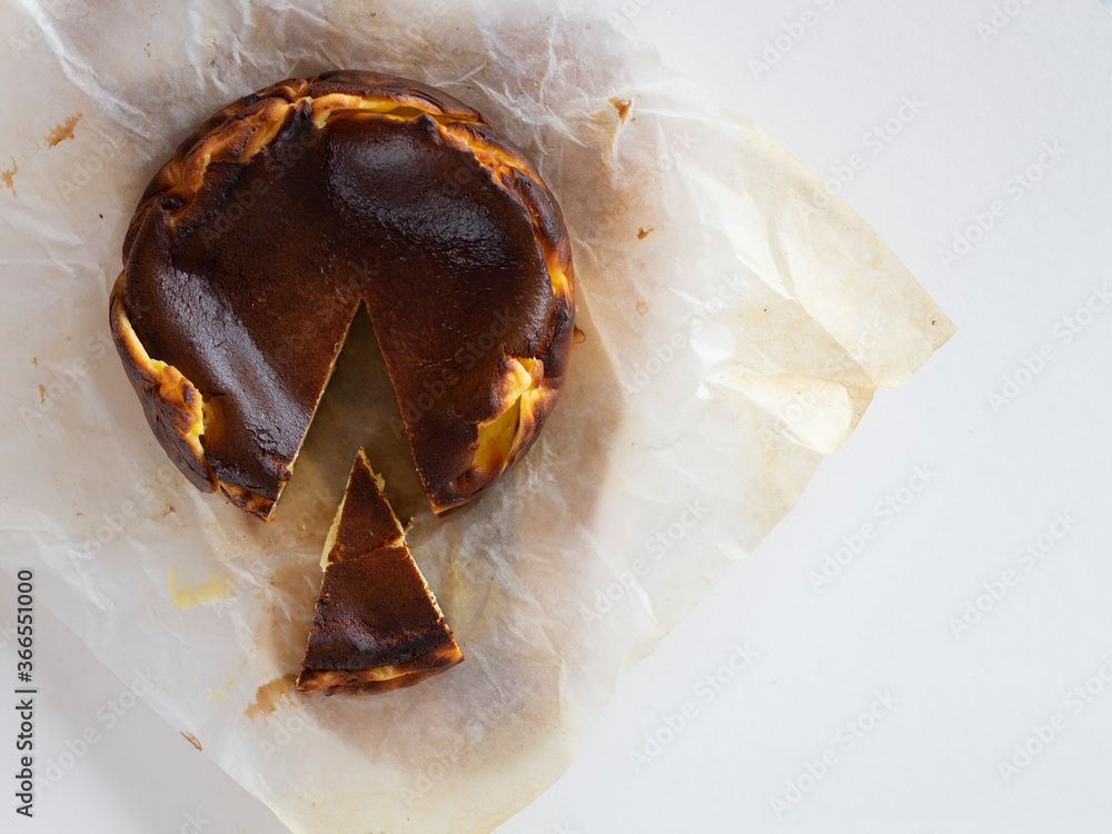 Burnt Cheese Cake, Basque Cheesecake on White Background with Copy ...
