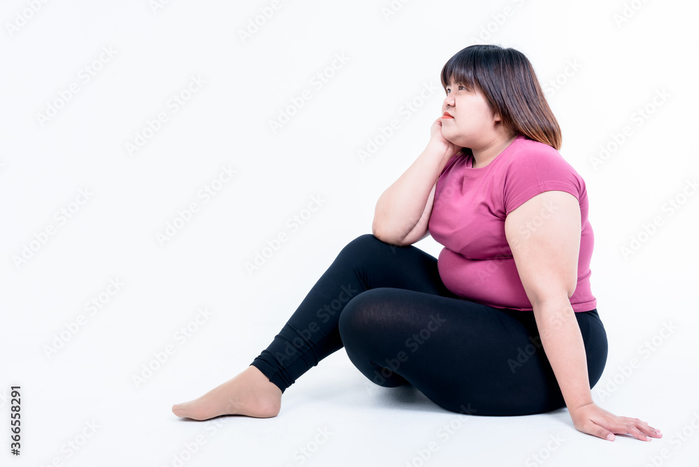 Portrait images of Fat woman sitting and she is sad Because of her ...