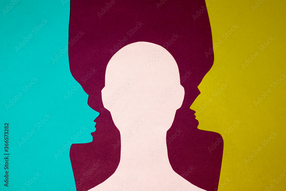 The paper profiles and paper full face were cut out from mint, yellow ...