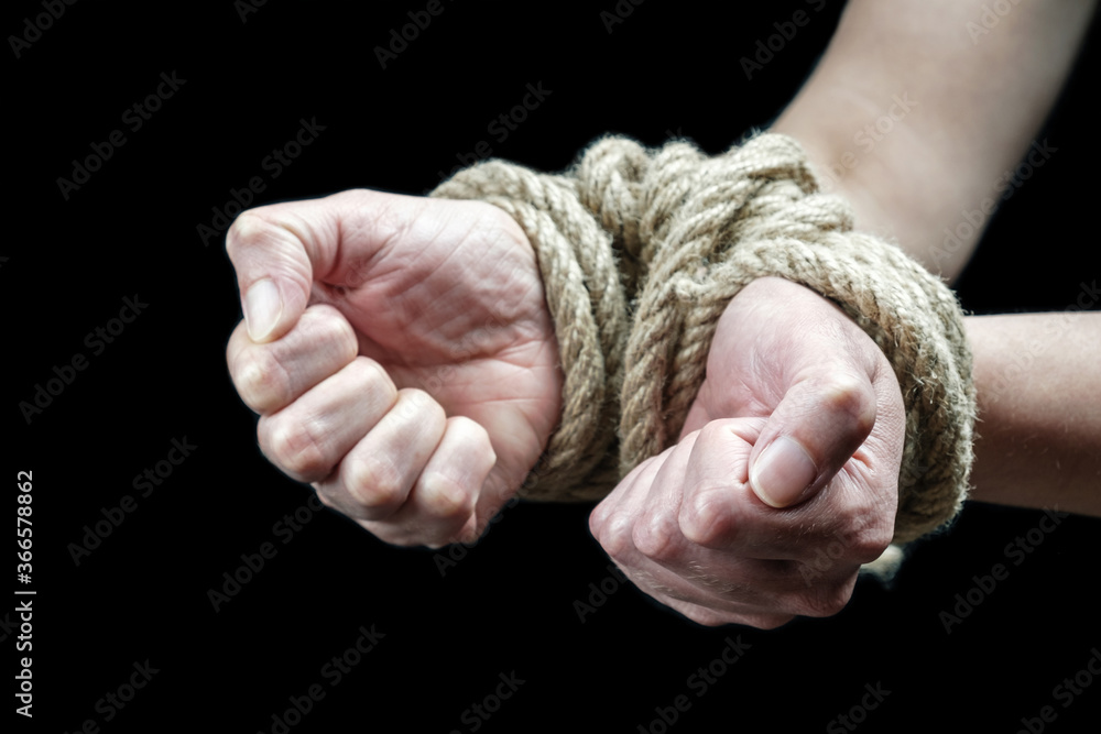 Hands Of A Victim Woman Tied Up With Rough Rope Stop Abusing Violence