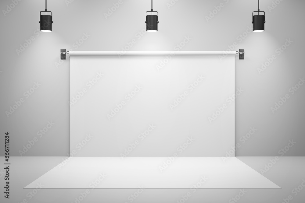 Empty white studio backdrops and spotlight on entertainment room ...