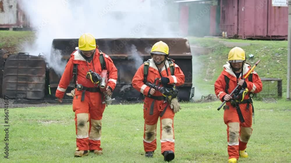 Fireman or firefighter teamwork from fire department wearing fire ...