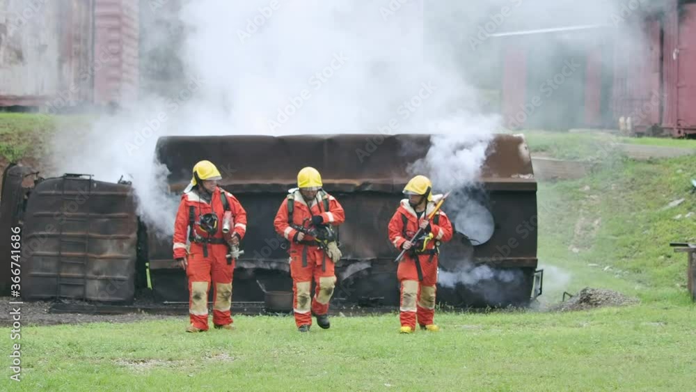Fireman or firefighter teamwork from fire department wearing fire ...