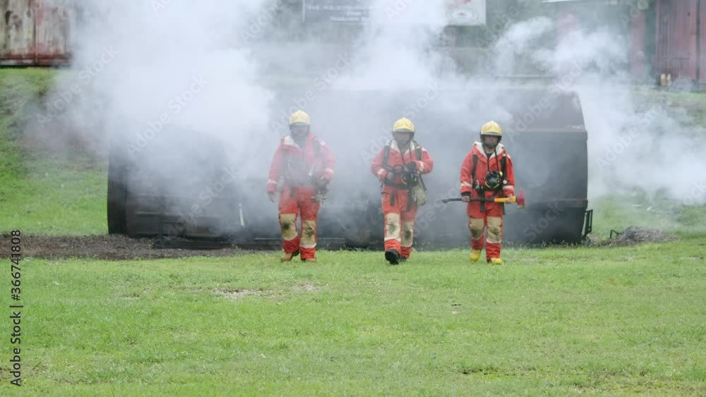 Fireman or firefighter teamwork from fire department wearing fire ...