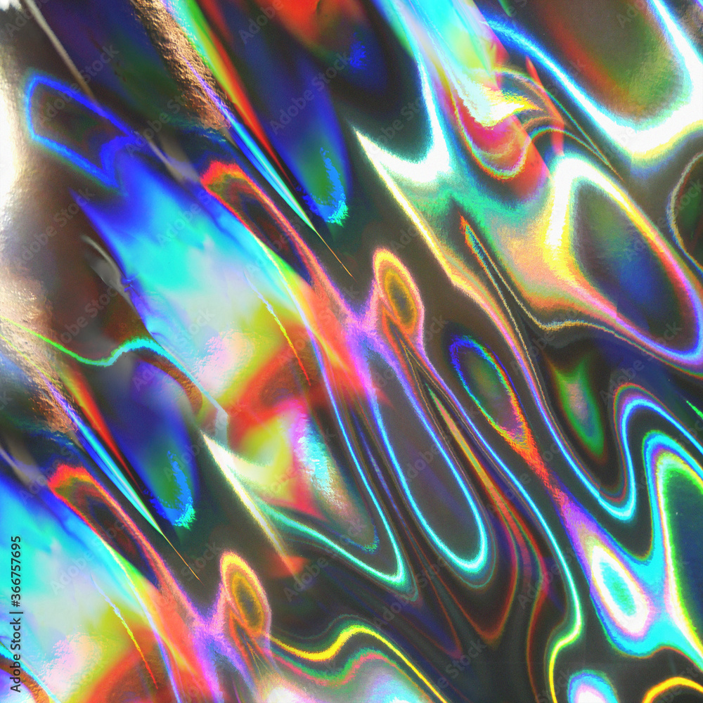Beautiful color refractive hologram of curved lines.Texture or ...