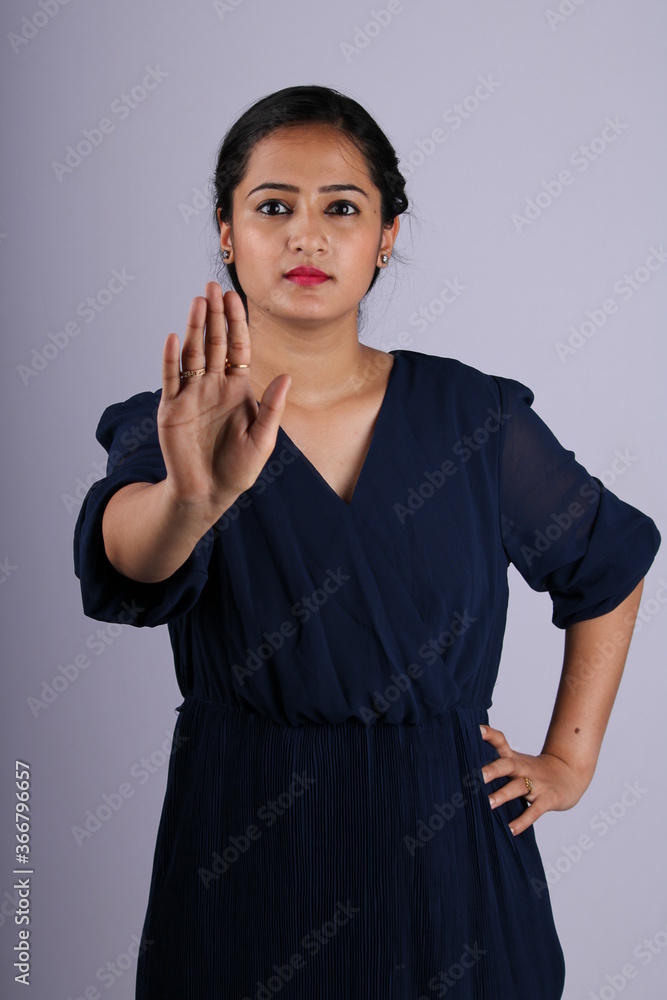 Poster Beautiful Indian girl taking tough stance and saying no, stop ...