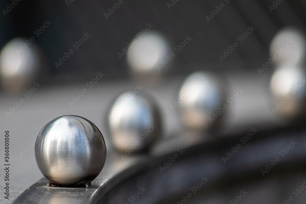 Matt steel balls in a row as decorative and ornamental balustrade and ...