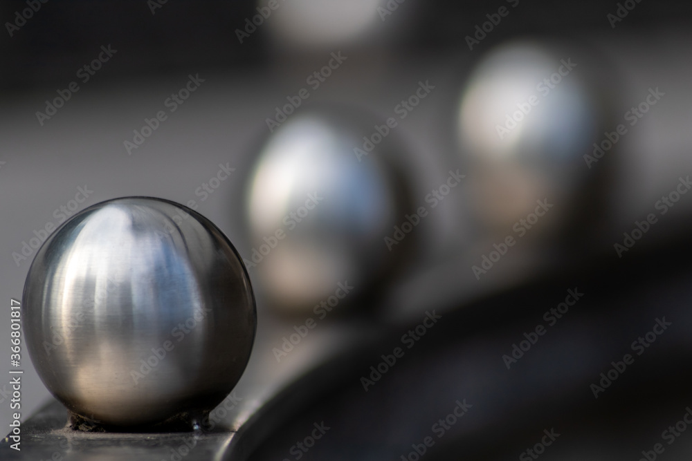 Matt steel balls in a row as decorative and ornamental balustrade and ...