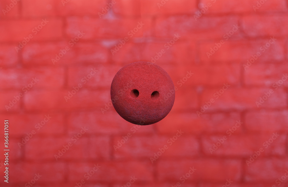 Red Nose Day, red clown nose on a red brick wall background Stock Photo ...