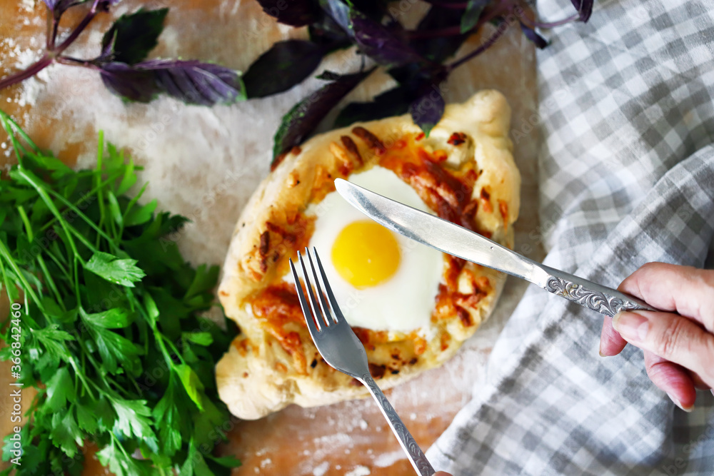 Selective focus. Khachapuri in Adjarian. Fresh homemade hot khachapuri ...