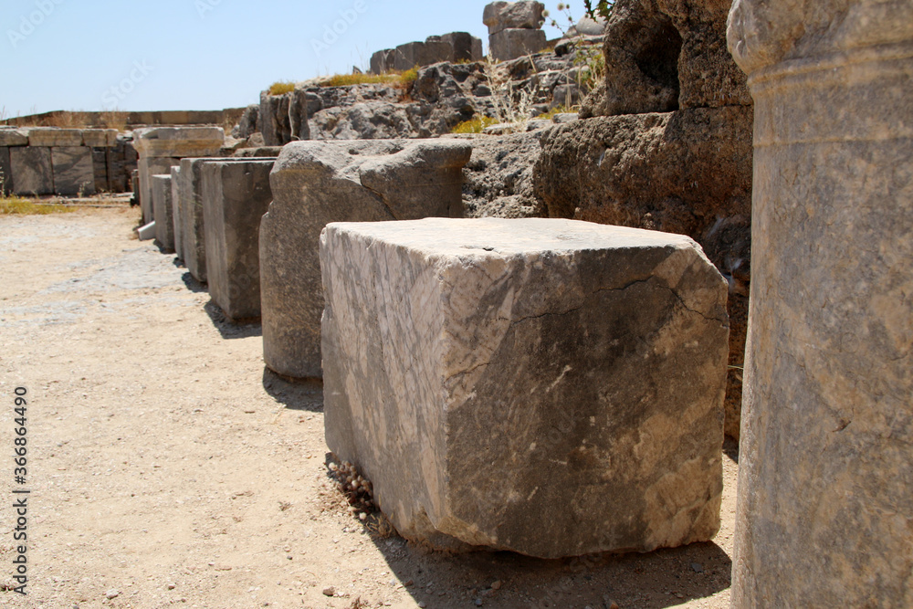 Stone bases of statues, the Acropolis of Lindos, Greece. The ...