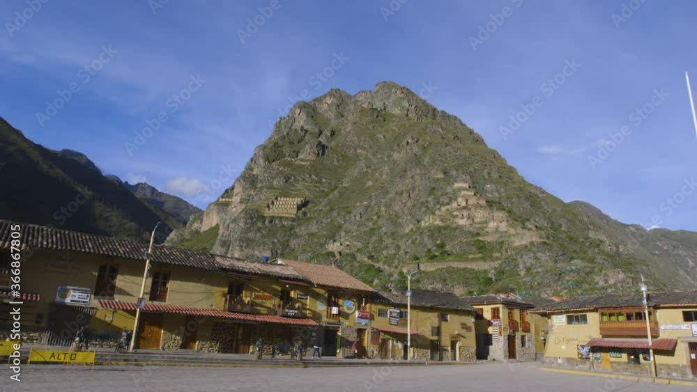 Plaza De Armas in Ollantaytambo with the Pinkuylluna Archeological Site ...