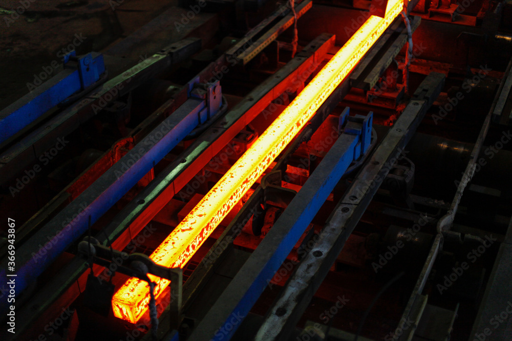 Red hot steel metal billets after molten steel casting. Continuous ...