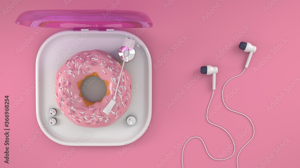 Donut on a record player with white earphones, music and gastronomy ...