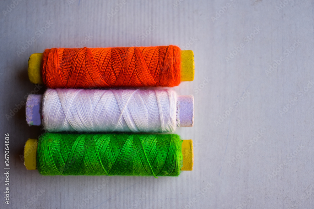 A view of Indian flag type sewing machine thread Stock Photo | Adobe Stock