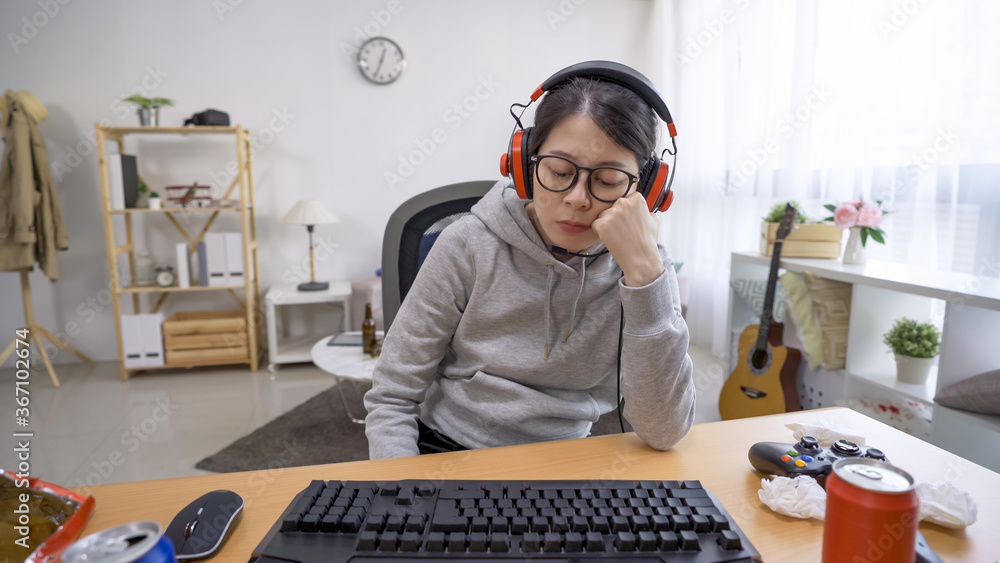 angry shocked young asian chinese girl gamer playing online video game ...