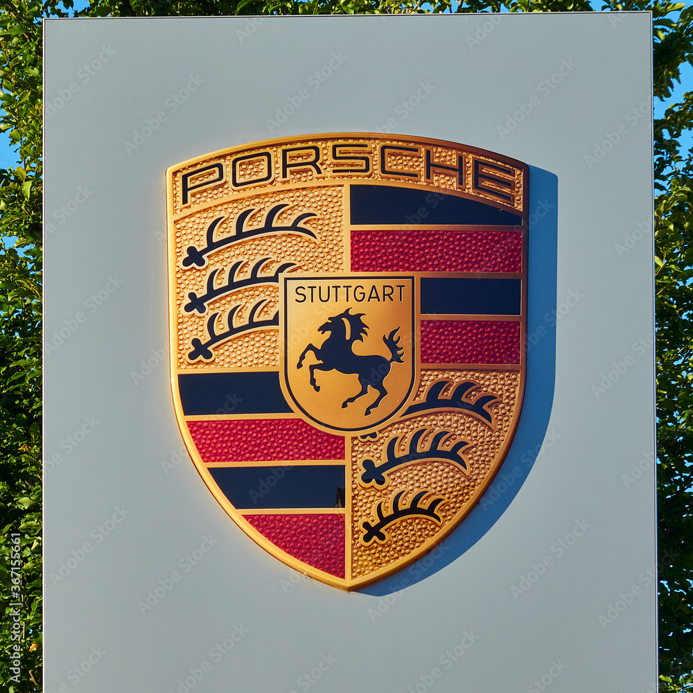 Large coat of arms and logo with the sign of the Porsche brand on a ...