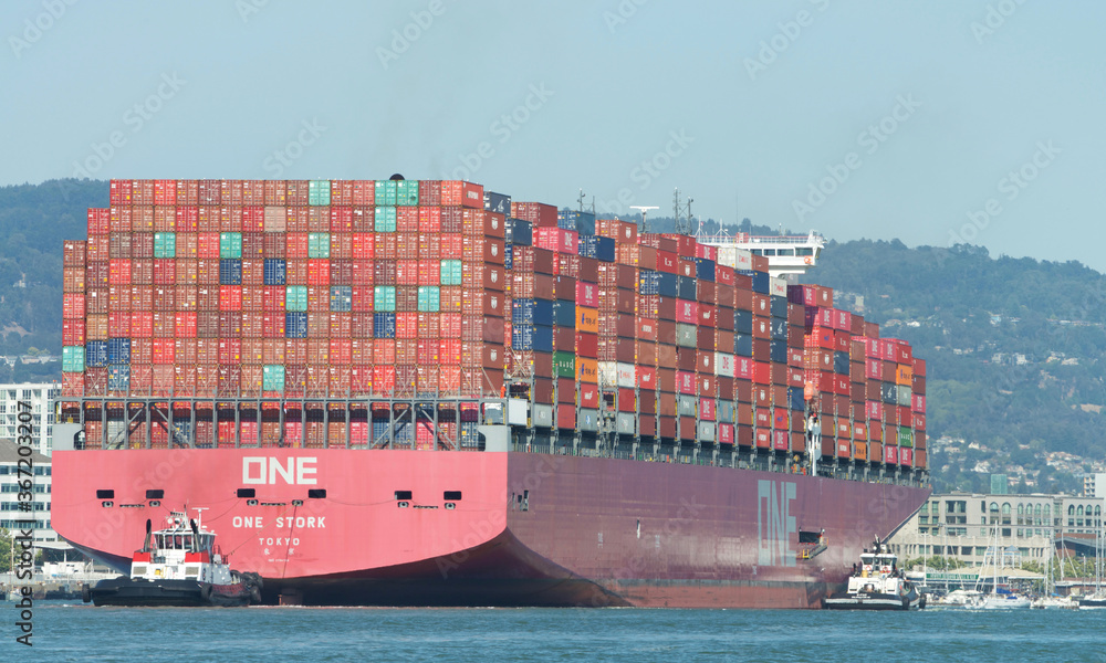 Oakland, CA - July 23, 2020: Multiple tugboats assist Cargo Ship ONE ...