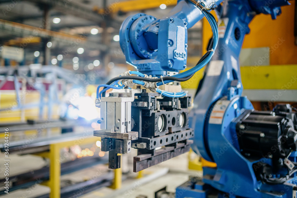 robot arm in factory Stock Photo | Adobe Stock