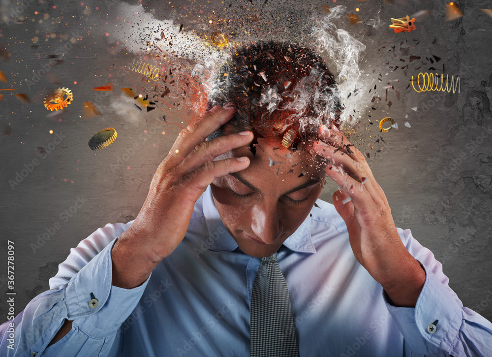Head explosion of a stressed and tired businessman due to overwork ...