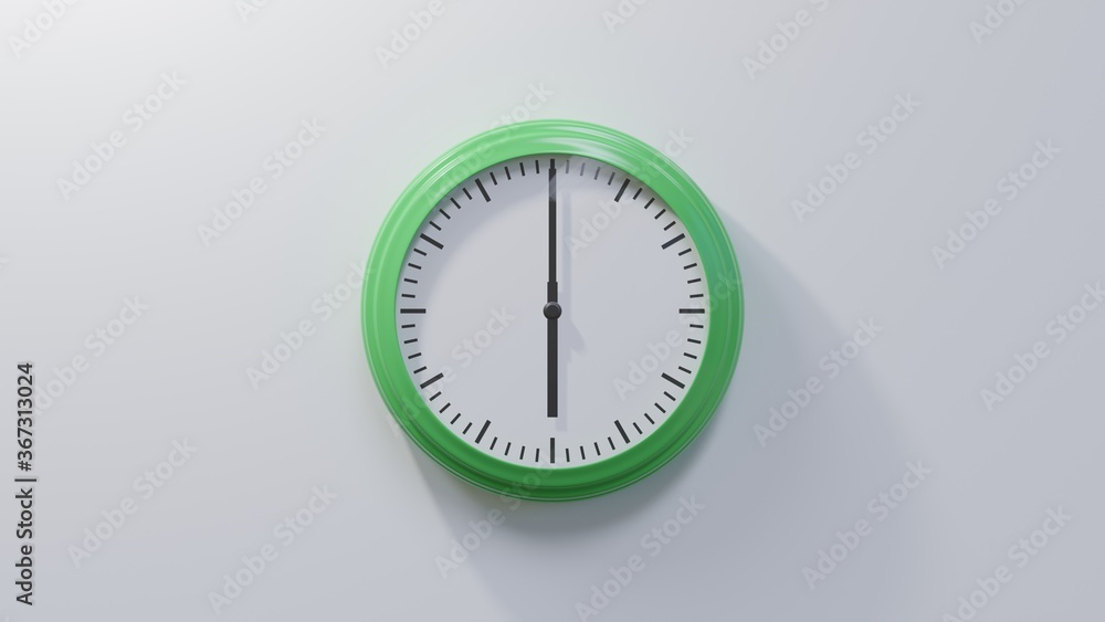 Glossy green clock on a white wall at six o'clock. Time is 06:00 or 18: ...