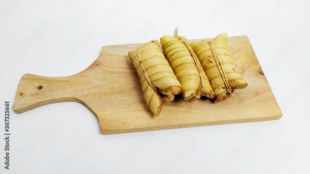 Lepet or leupeut Indonesian traditional food with glutinous rive and ...