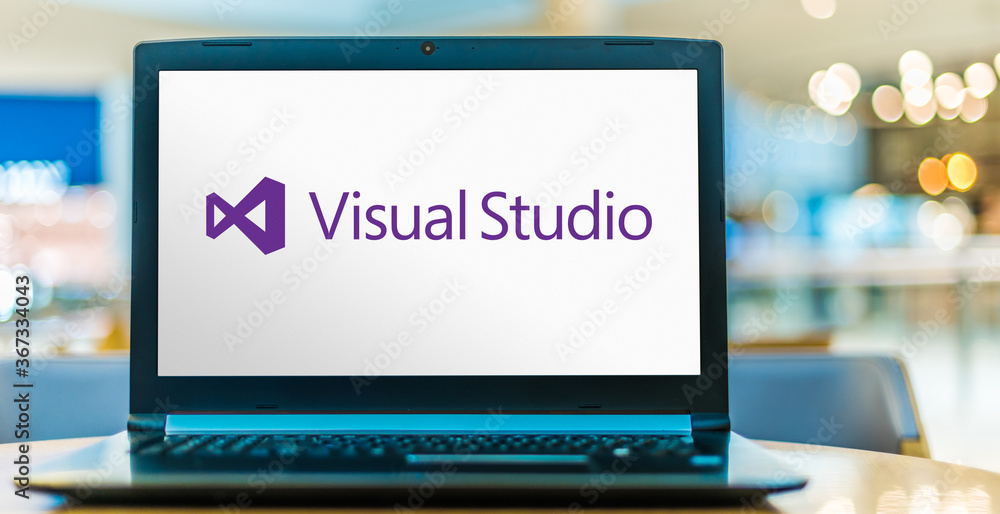 Laptop computer displaying logo of Microsoft Visual Studio Stock Photo ...