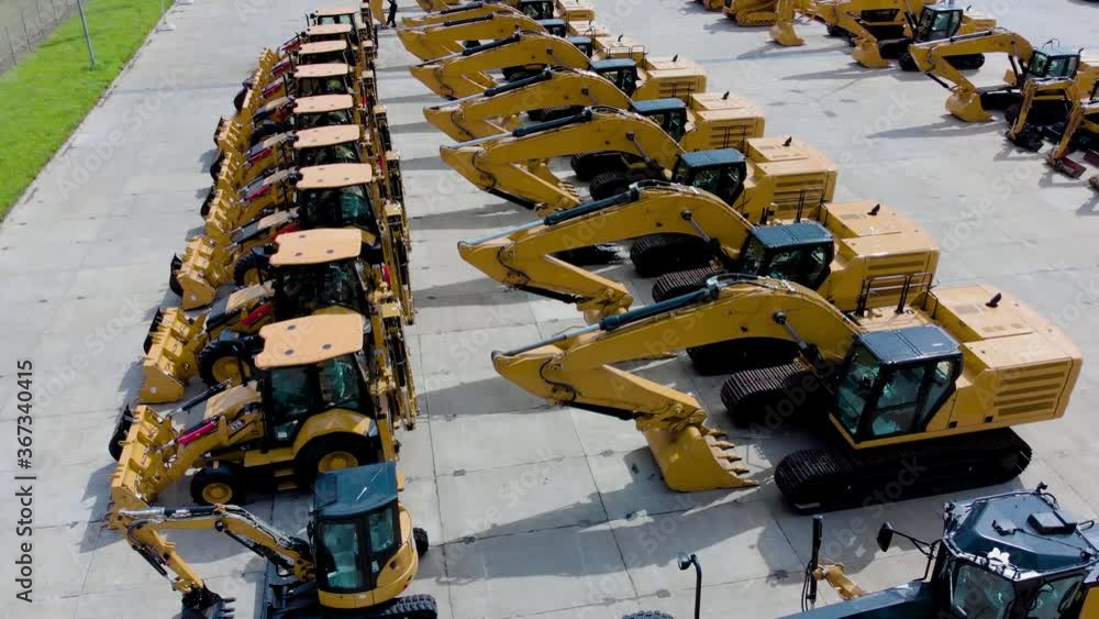 heavy construction equipment store. excavator, bulldozer, grader, front ...
